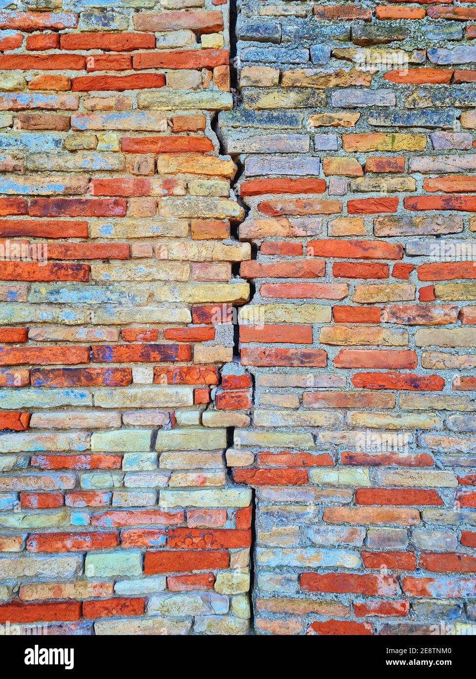Old brick wall split by a crack Stock Photo - Alamy
