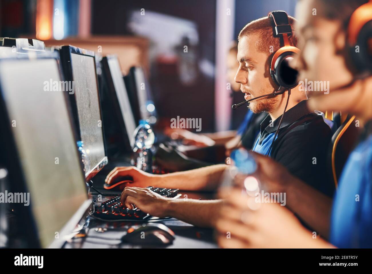 Cybersport concept. Side view of a focused ,professional male gamer ...