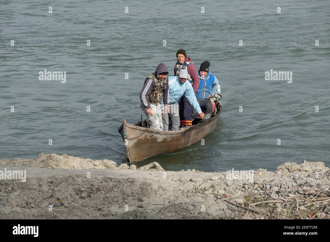People going ashore with av boat in Romania Stock Photo - Alamy