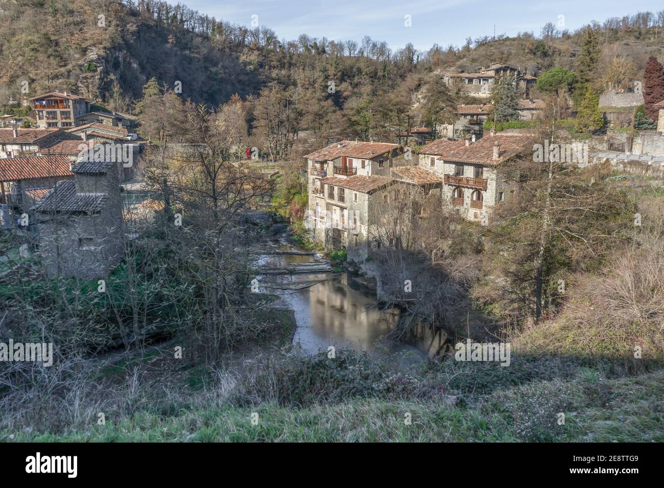 View of the river with old cereal mills in ancient medieval village of ...
