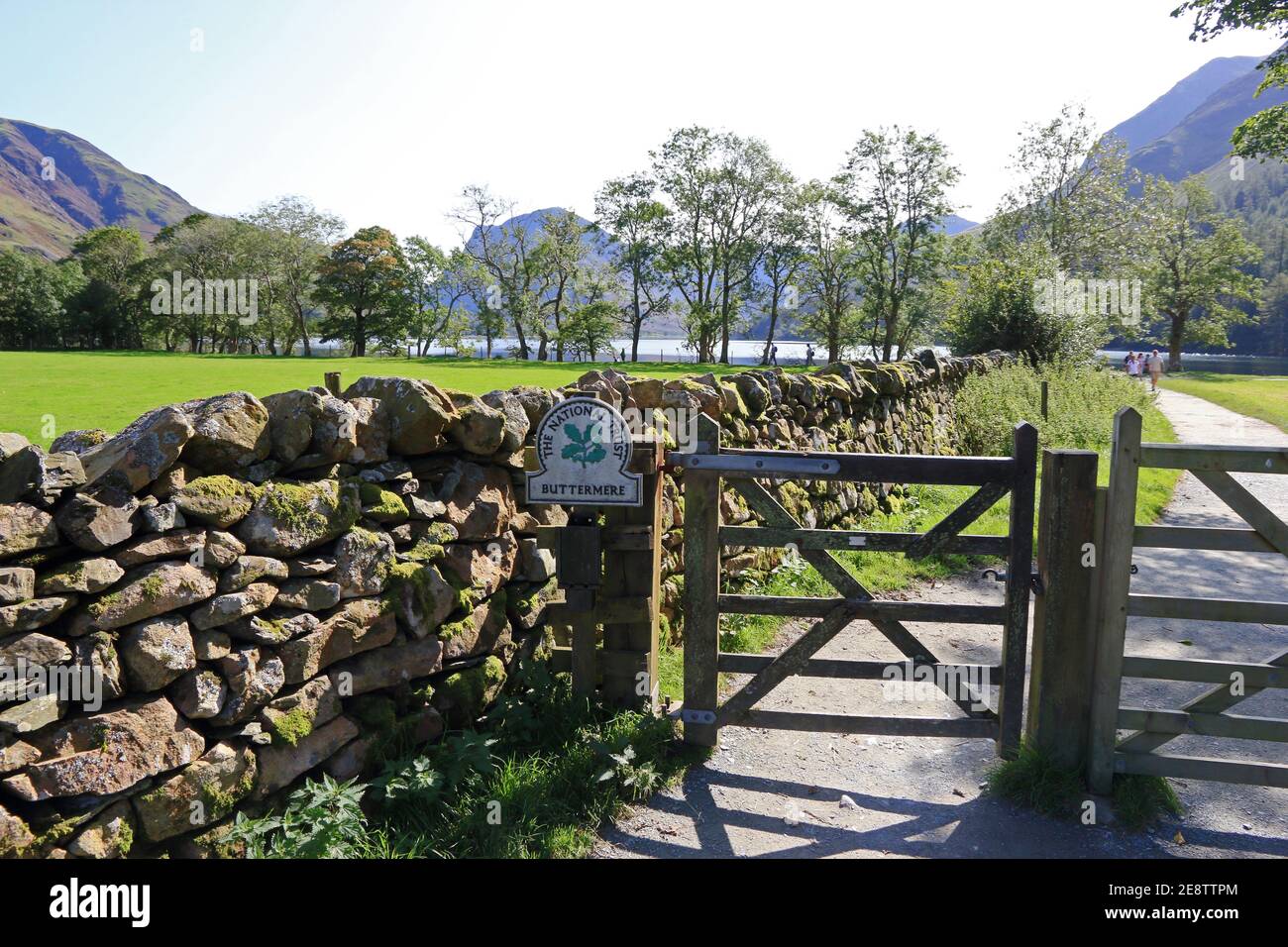 National Trust sign on gatepost at entry point to walk around ...