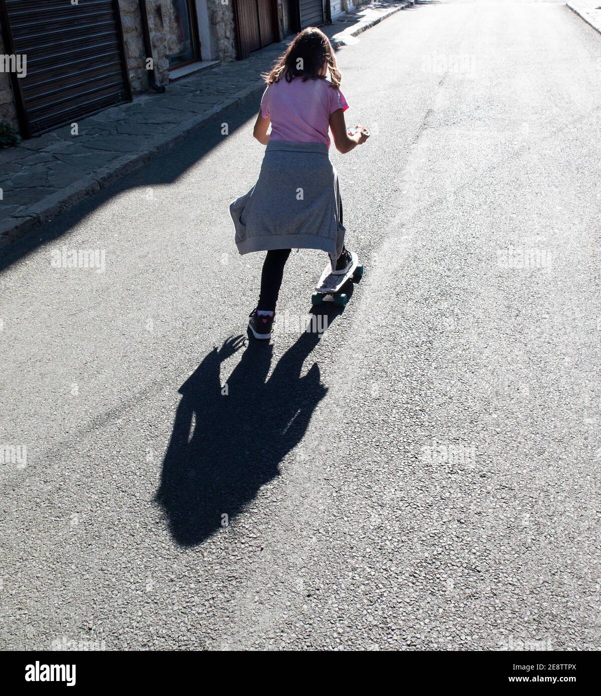 A woman walking on special springy shoes Stock Photo - Alamy