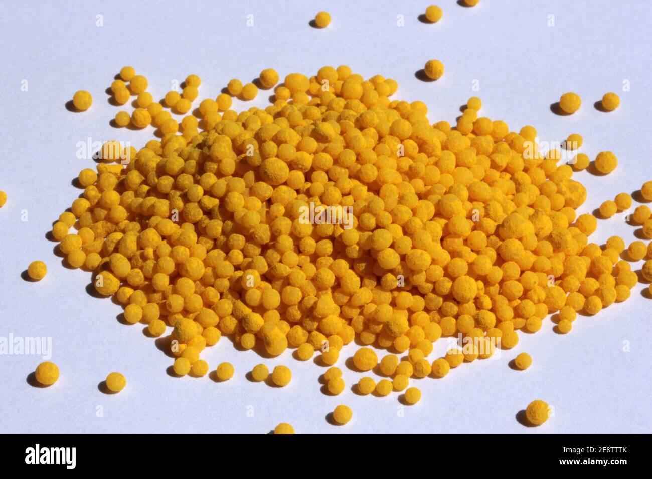 powder food colors on a white background Stock Photo - Alamy