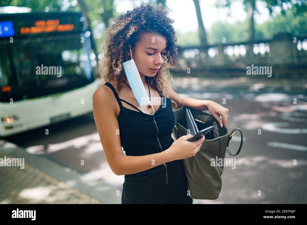 Young woman wearing her mask inappropriately during virus pandemic ...