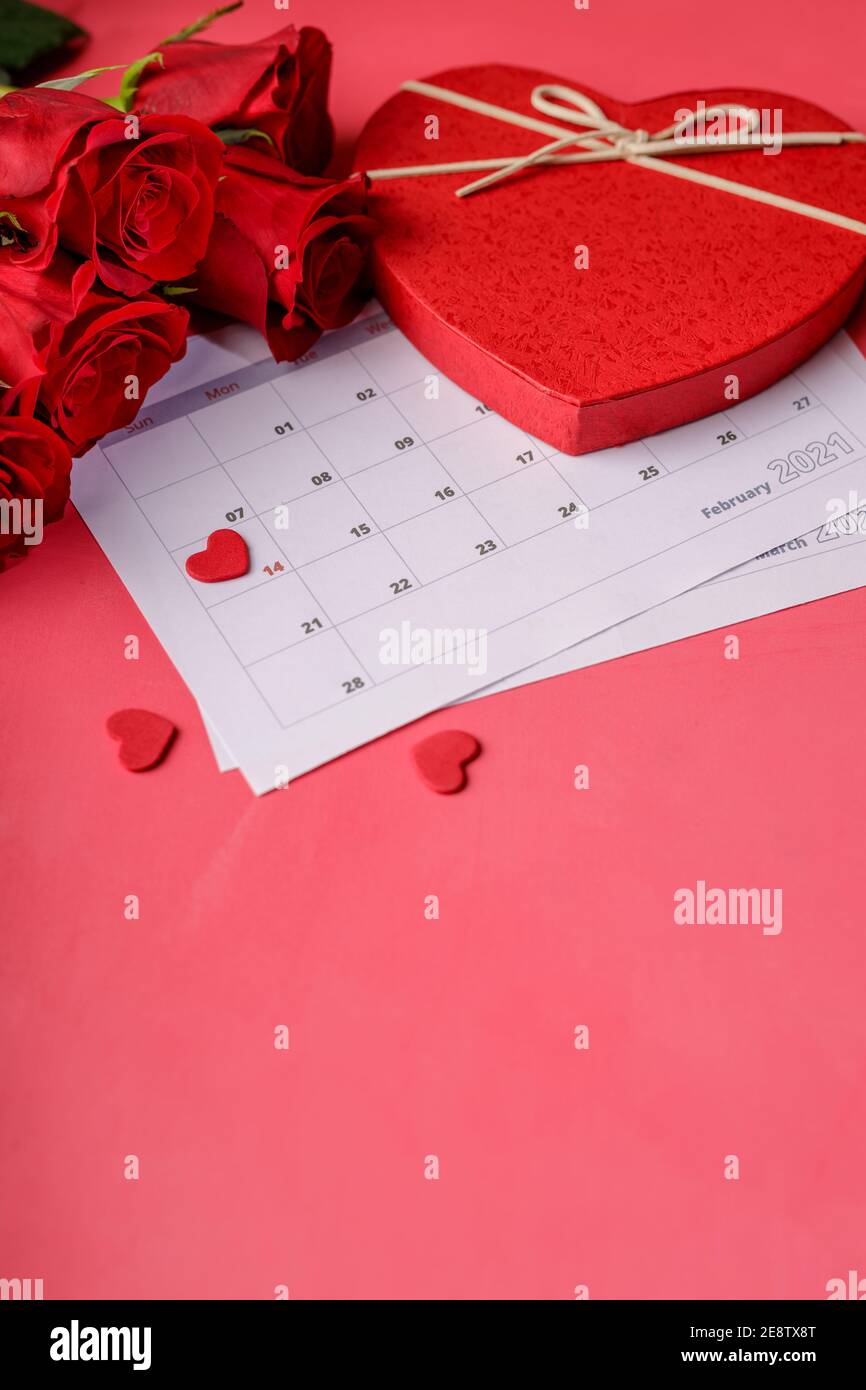Valentine day. Red hearths and roses on Calendar page. February 14 of ...