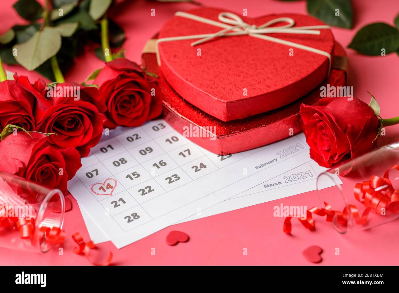 Valentine day. Red hearths and roses on Calendar page. February 14 of ...