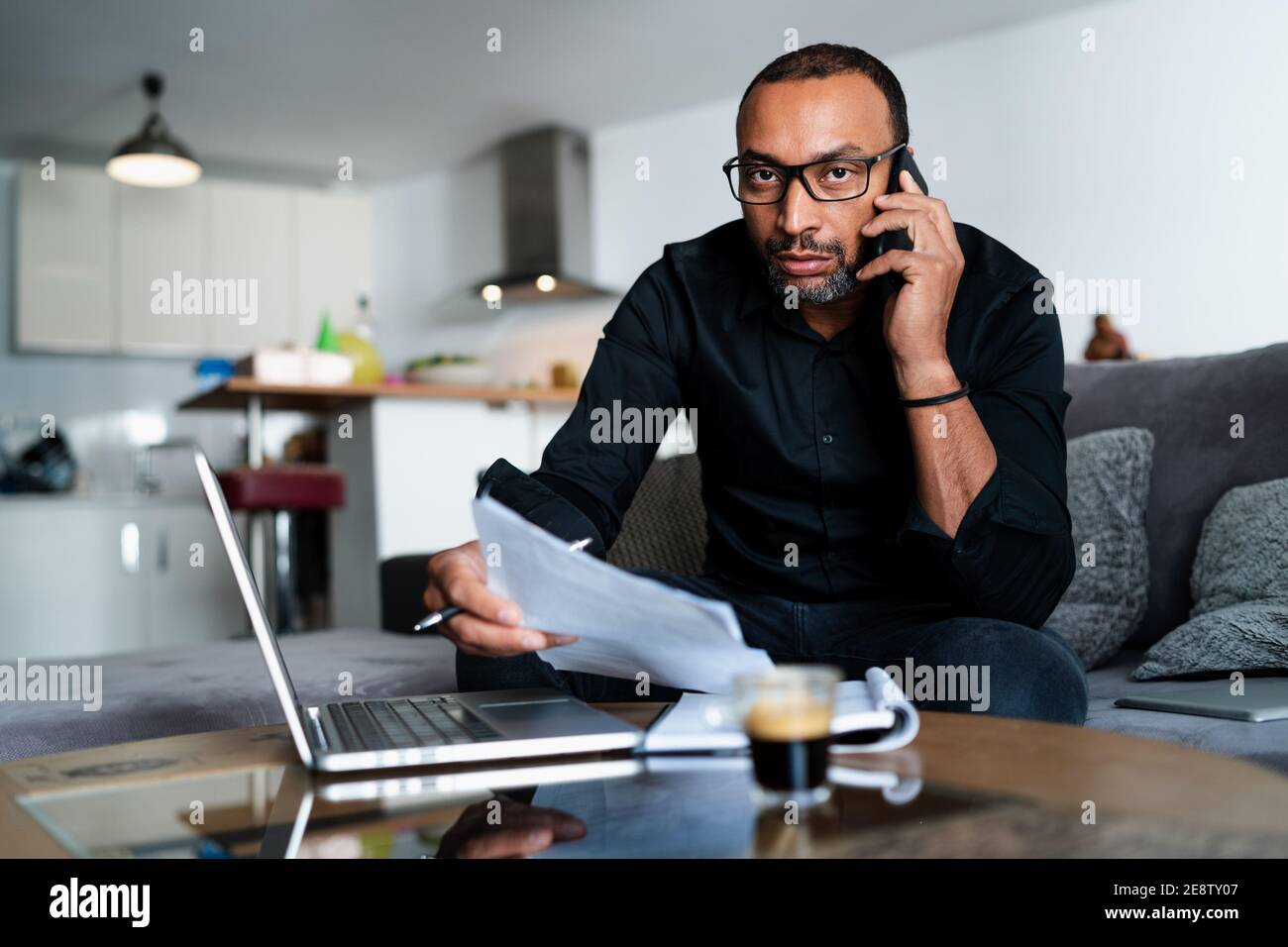 40 years old man accounting at home Stock Photo - Alamy