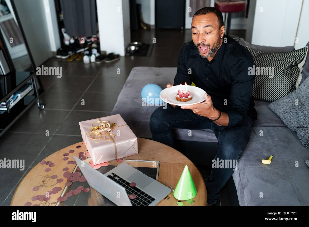 Handsome 40 years old man blowing candles on his birthday cake Stock ... Handsome 40 years old man blowing candles on his birthday cake Stock ...