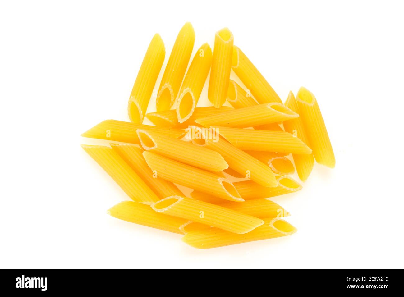 Raw penne pasta ready for bowl Stock Photo - Alamy