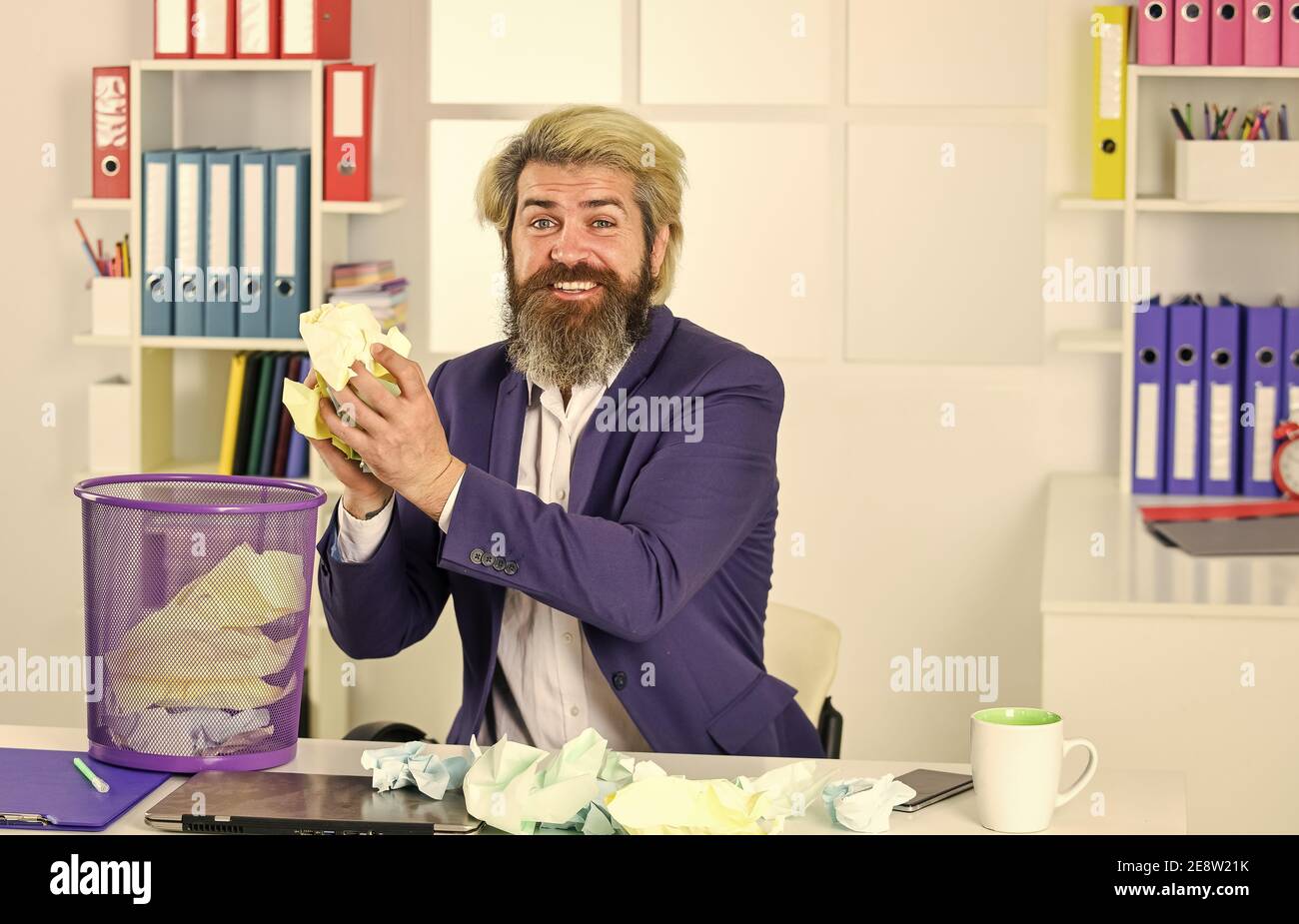 Man looking through the garbage container hi-res stock photography and ...