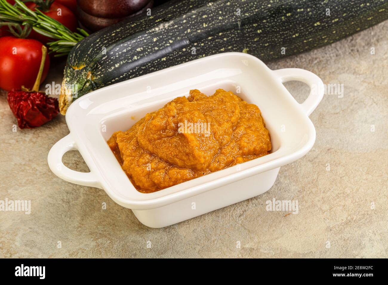 Vegetarian cuisine - Zucchini puree with herbs and spices Stock Photo ...