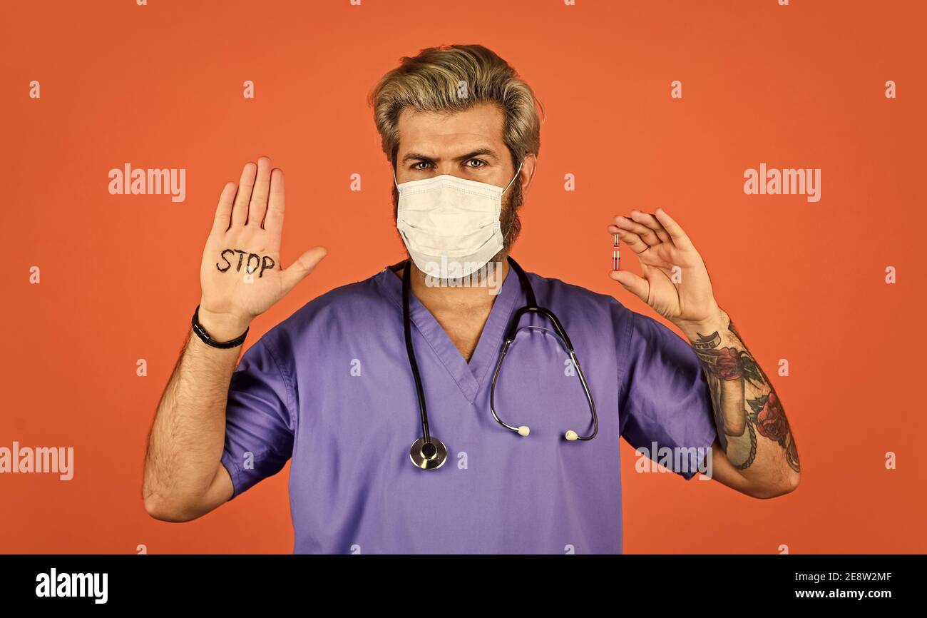 Open palm stop gesture. Epidemic threshold. Man in medical lab ...