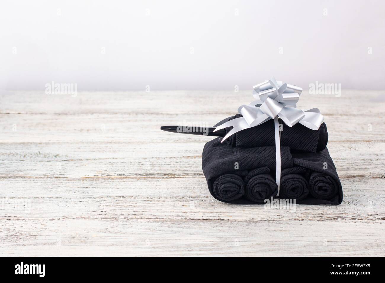 Handmade tanks of socks as gift to men on February 23 on white ...