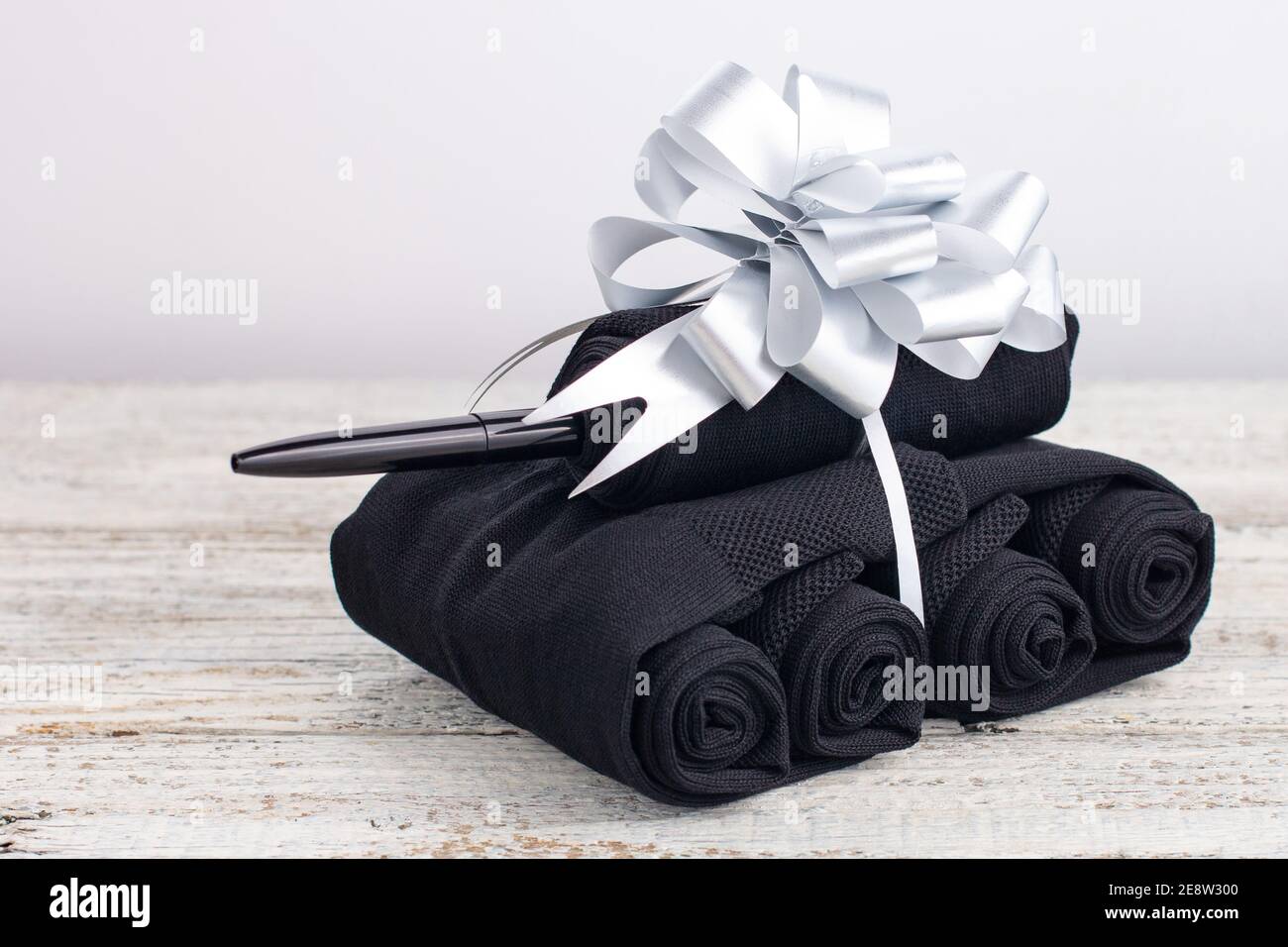 Handmade tanks of socks as gift to men on February 23 on white ...