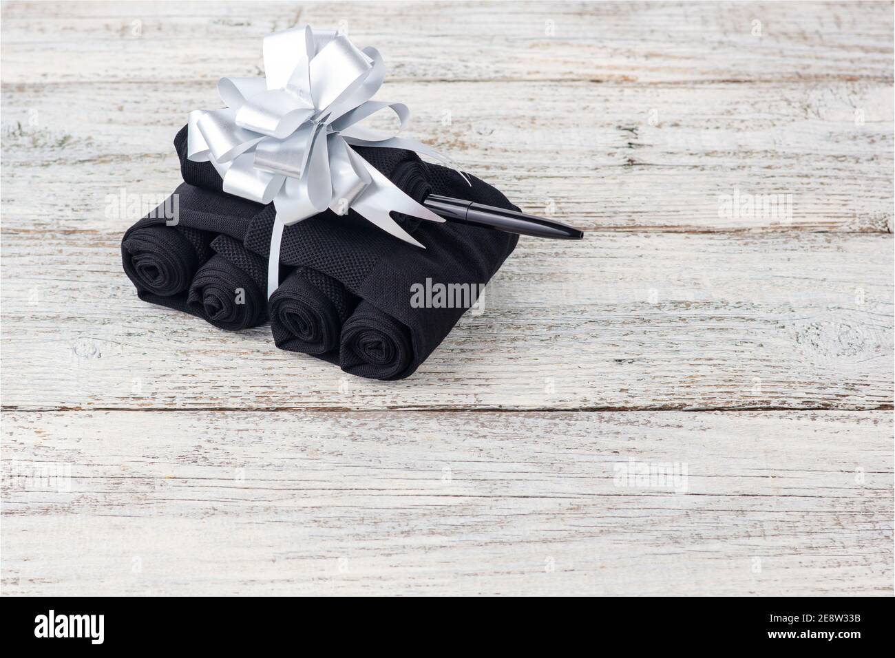 Handmade tanks of socks as gift to men on February 23 on white ...