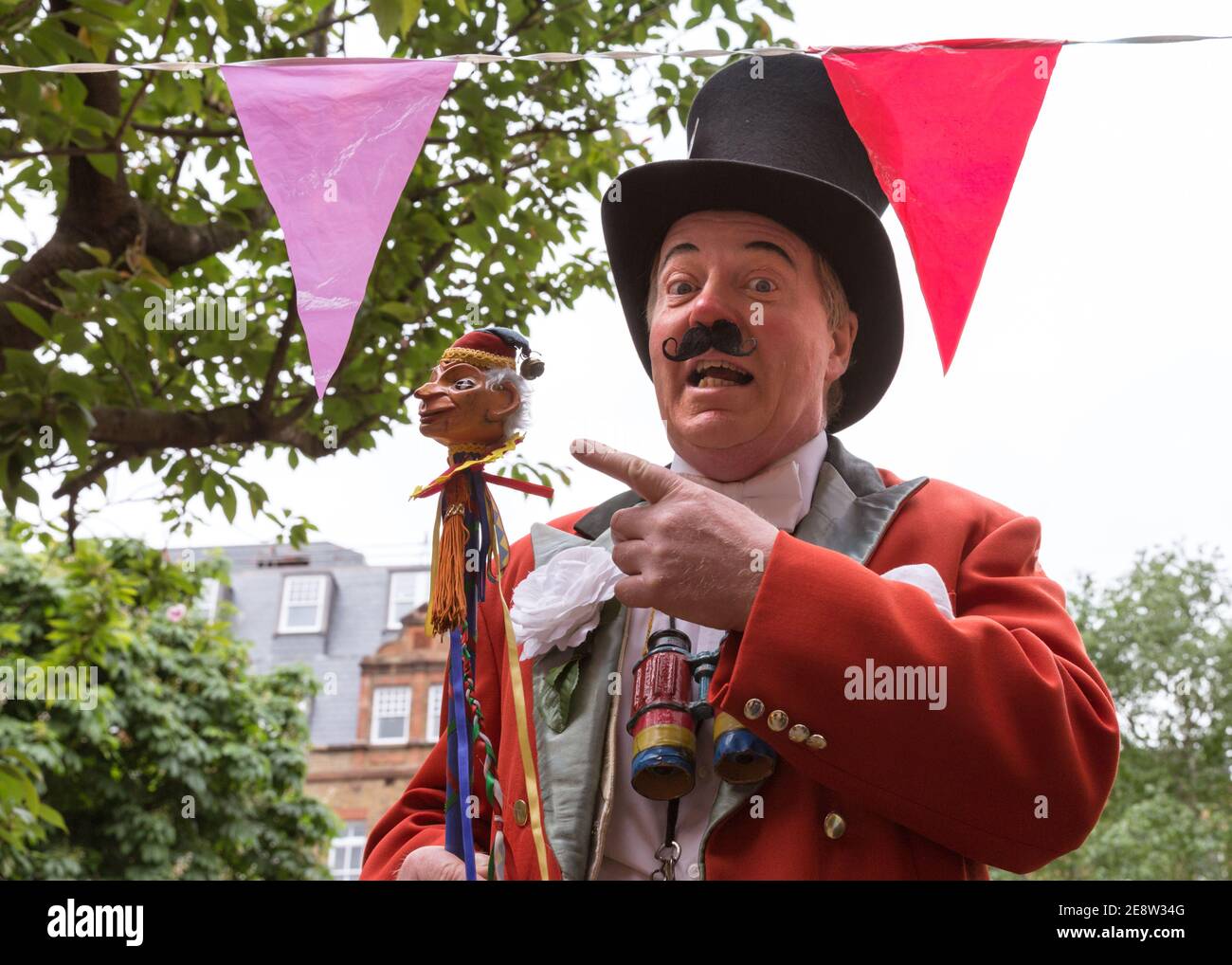 Performer with punch puppet at the Covent Garden May Fayre and Puppet ...