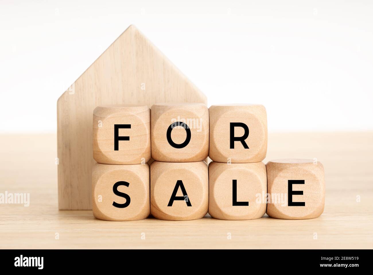For Sale concept. Real estate market. Wooden blocks with text and house ...