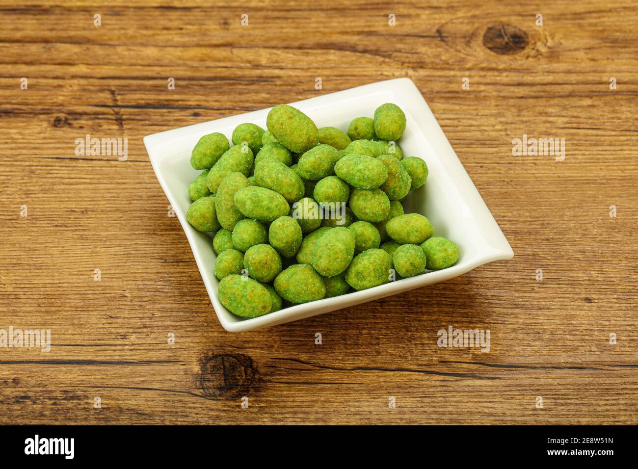 Spicy wasabi peanuts snack in the bowl Stock Photo - Alamy