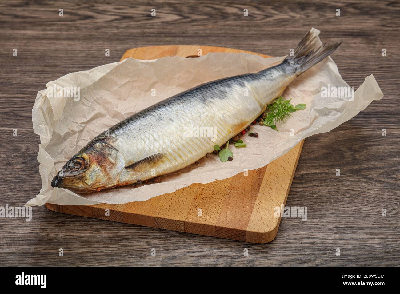 Salted Herring fish with pepper and spices Stock Photo - Alamy