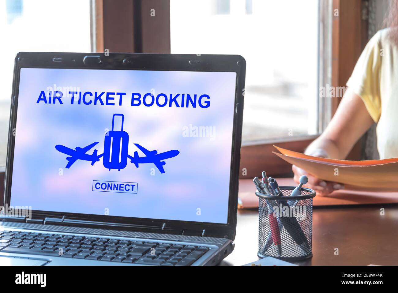 Laptop screen displaying an air ticket booking concept Stock Photo - Alamy