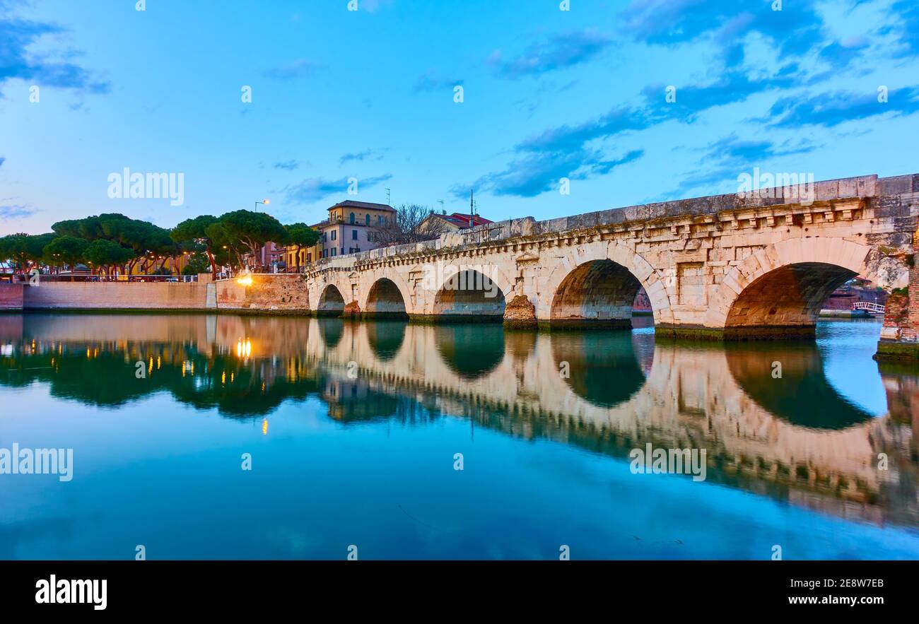 Rimini with Bridge of Tiberius at dusk, Emilia-Romagna, Italy ...