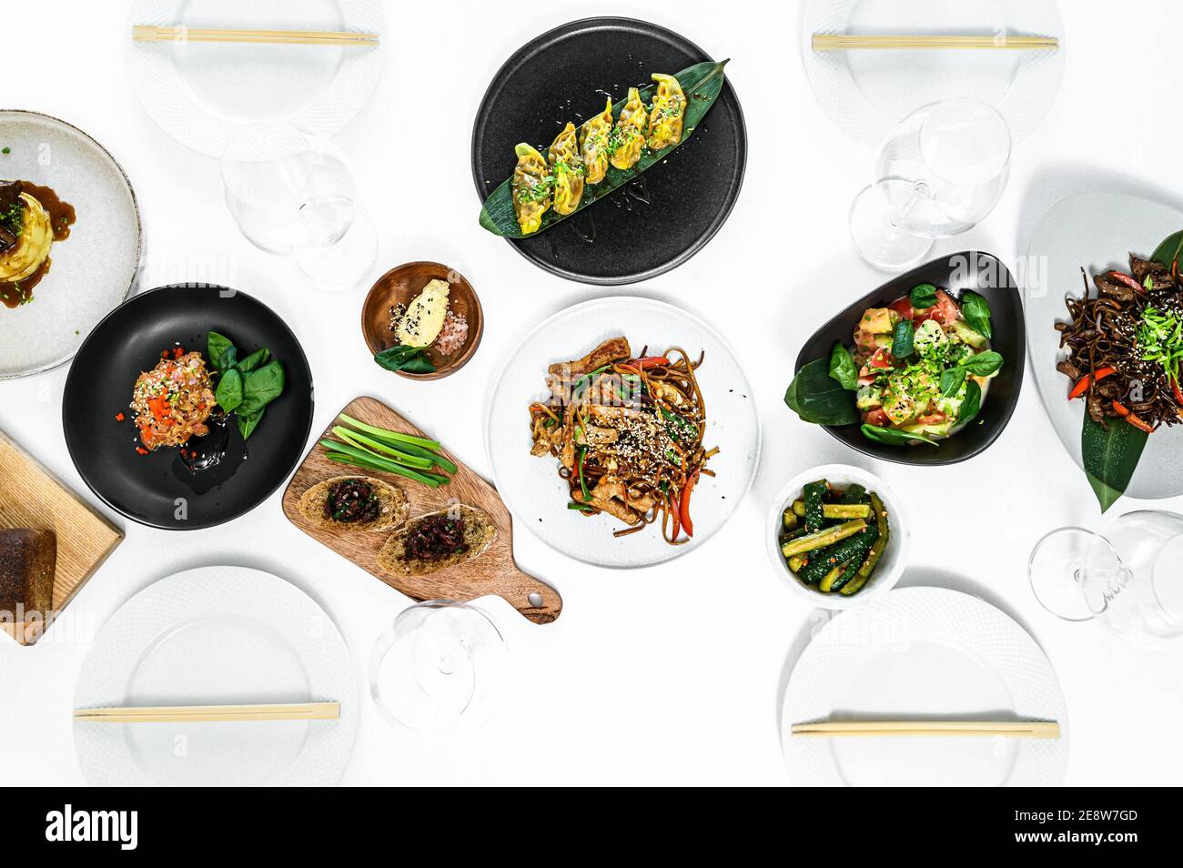 Asian food served on white table. Chinese and vietnamese cuisine set ...