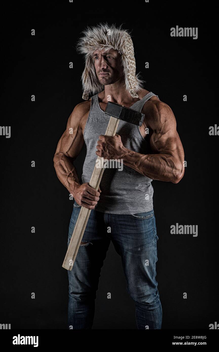 Working man hold hammer tool in muscular arms biceps triceps in casual ...