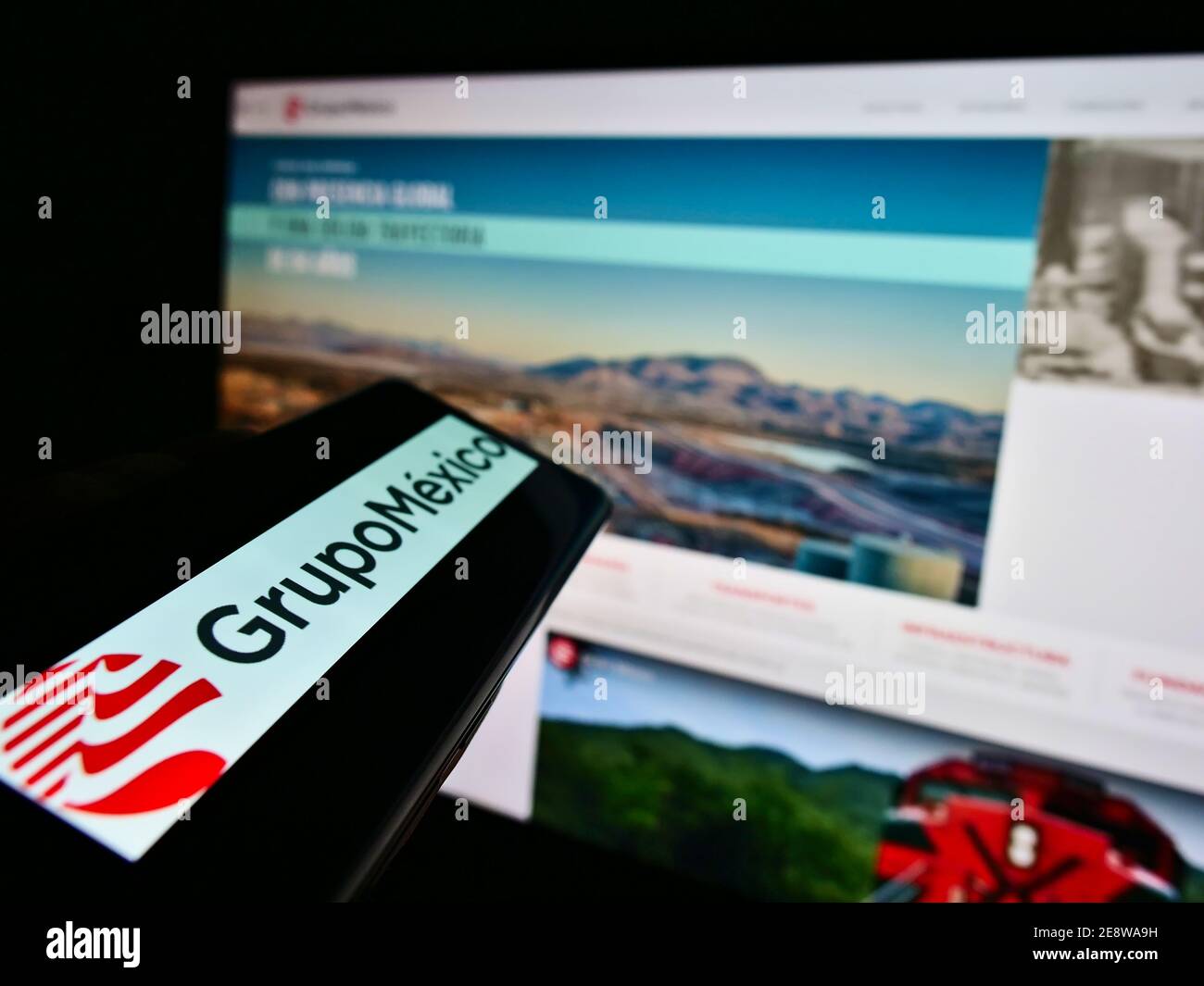 Smartphone with logo of Mexican mining company Grupo México on screen ...