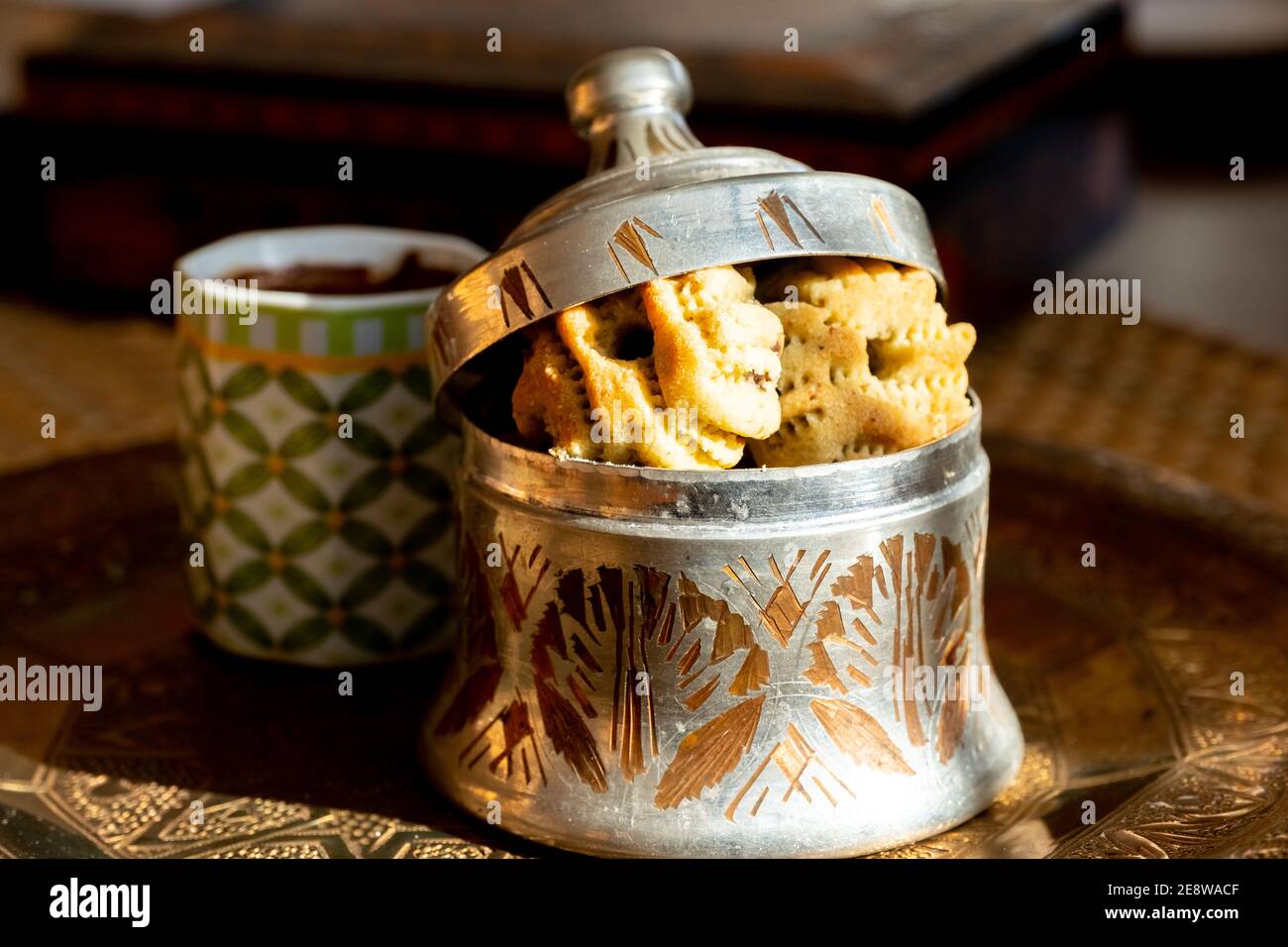 Arabic sweets, maamoul and coffee on traditional background Stock Photo ...