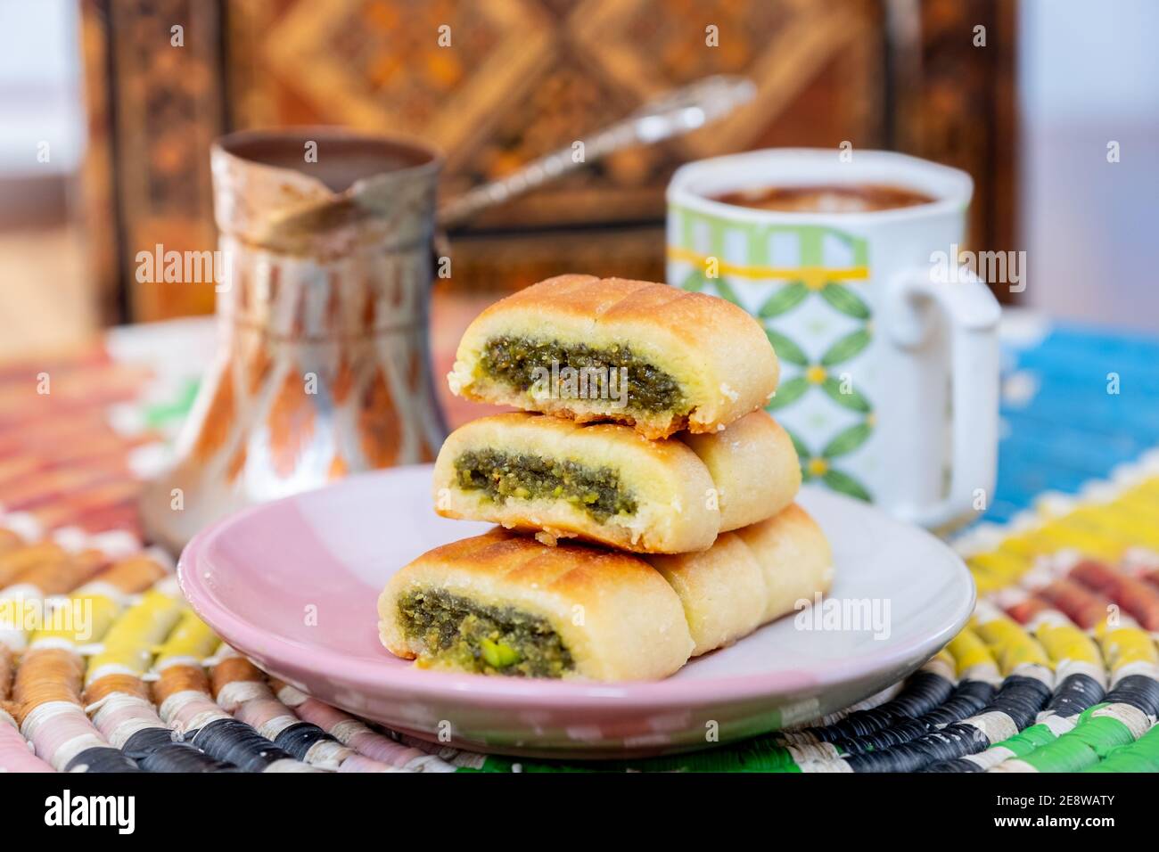 Arabic sweets, maamoul and coffee on traditional background Stock Photo ...
