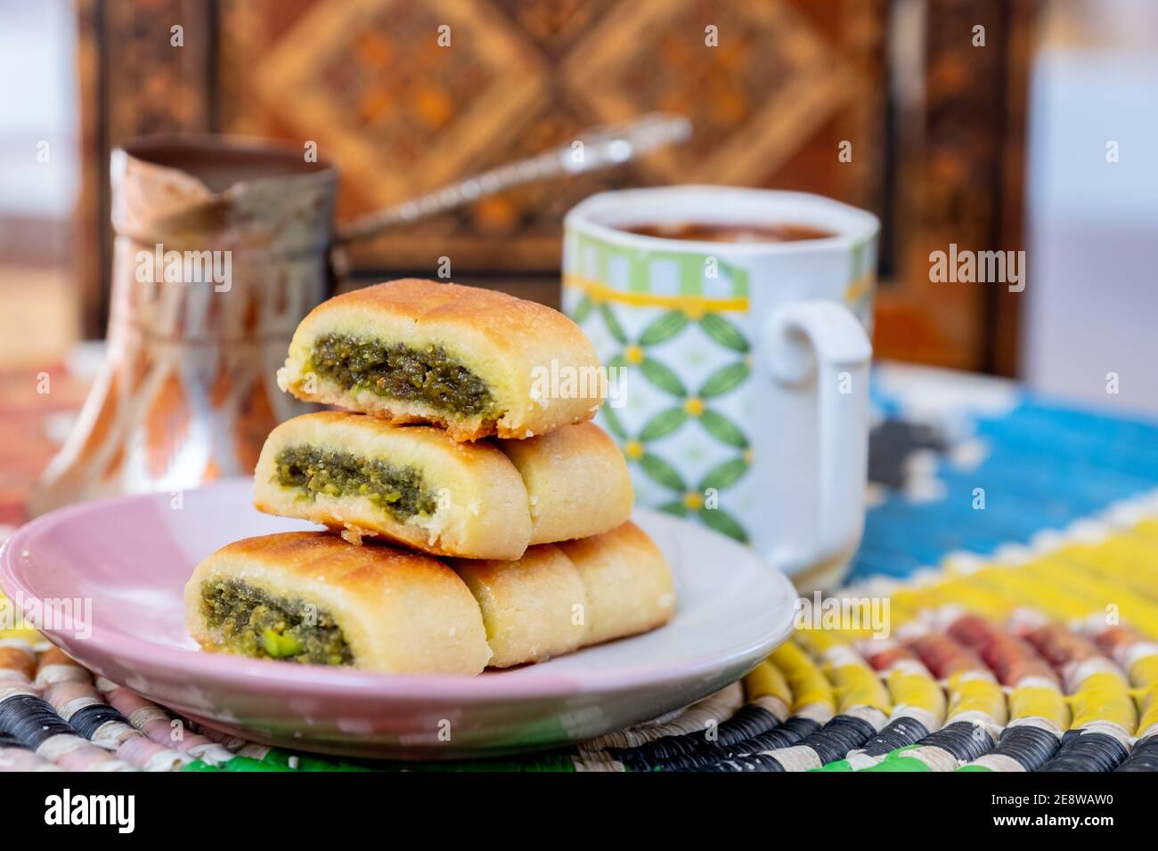 Arabic sweets, maamoul and coffee on traditional background Stock Photo ...
