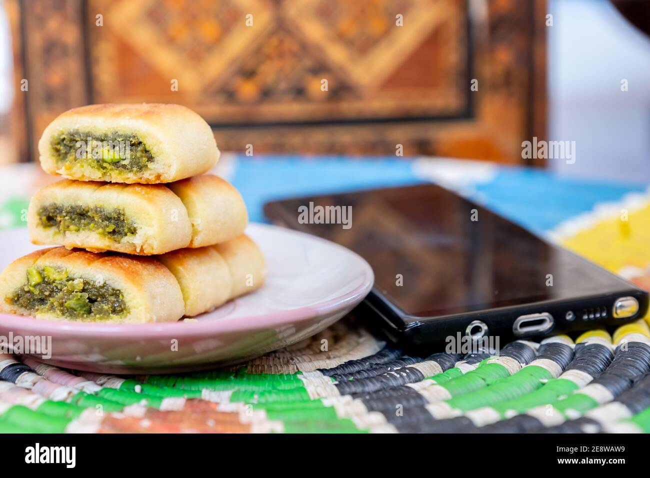 mobile phone with Arabic maamoul and colored background ,Palestinian ...