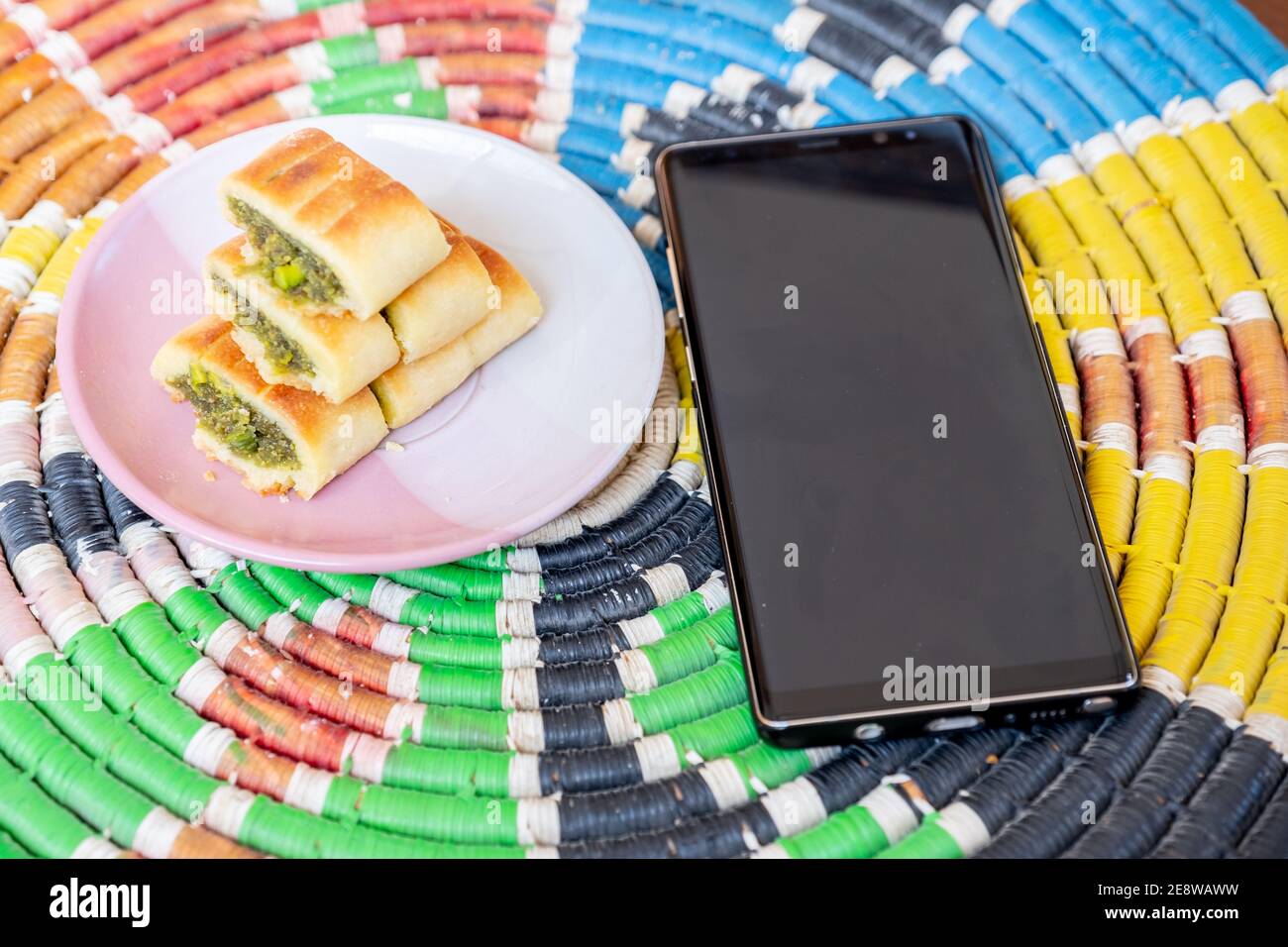 mobile phone with Arabic maamoul and colored background ,Palestinian ...