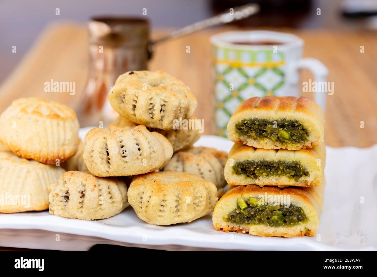 Arabic sweets, maamoul and coffee on traditional background Stock Photo ...