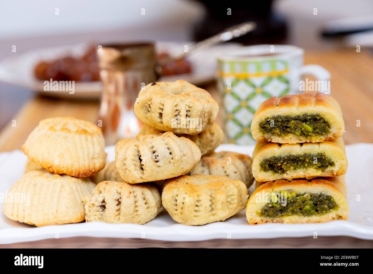 Arabic sweets, maamoul and coffee on traditional background Stock Photo ...