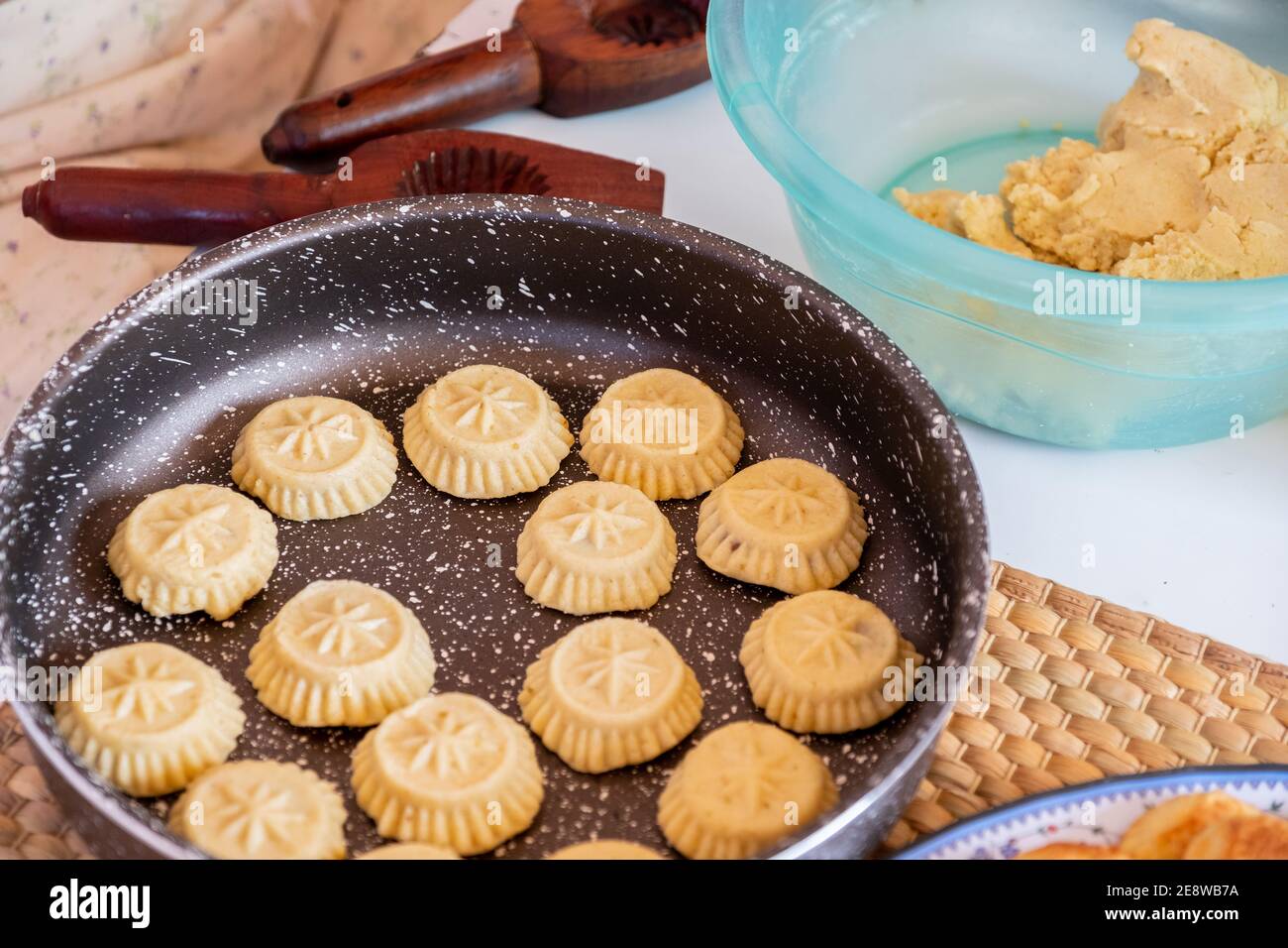 Arabic woman hands making eid sweets ,cookiesand mamoul Stock Photo - Alamy