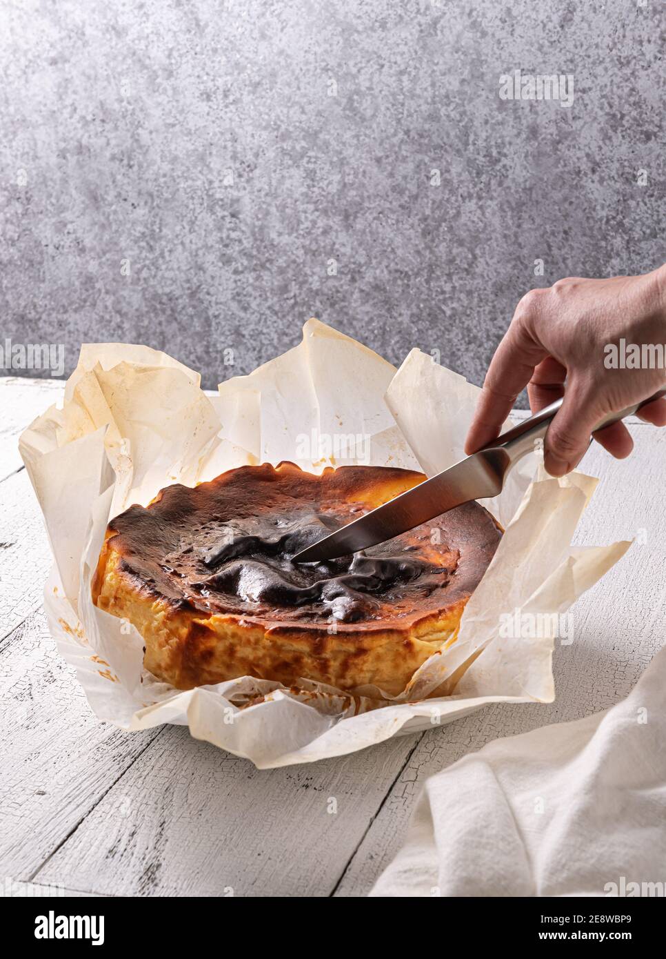 Woman cutting homemade basque hi-res stock photography and images - Alamy