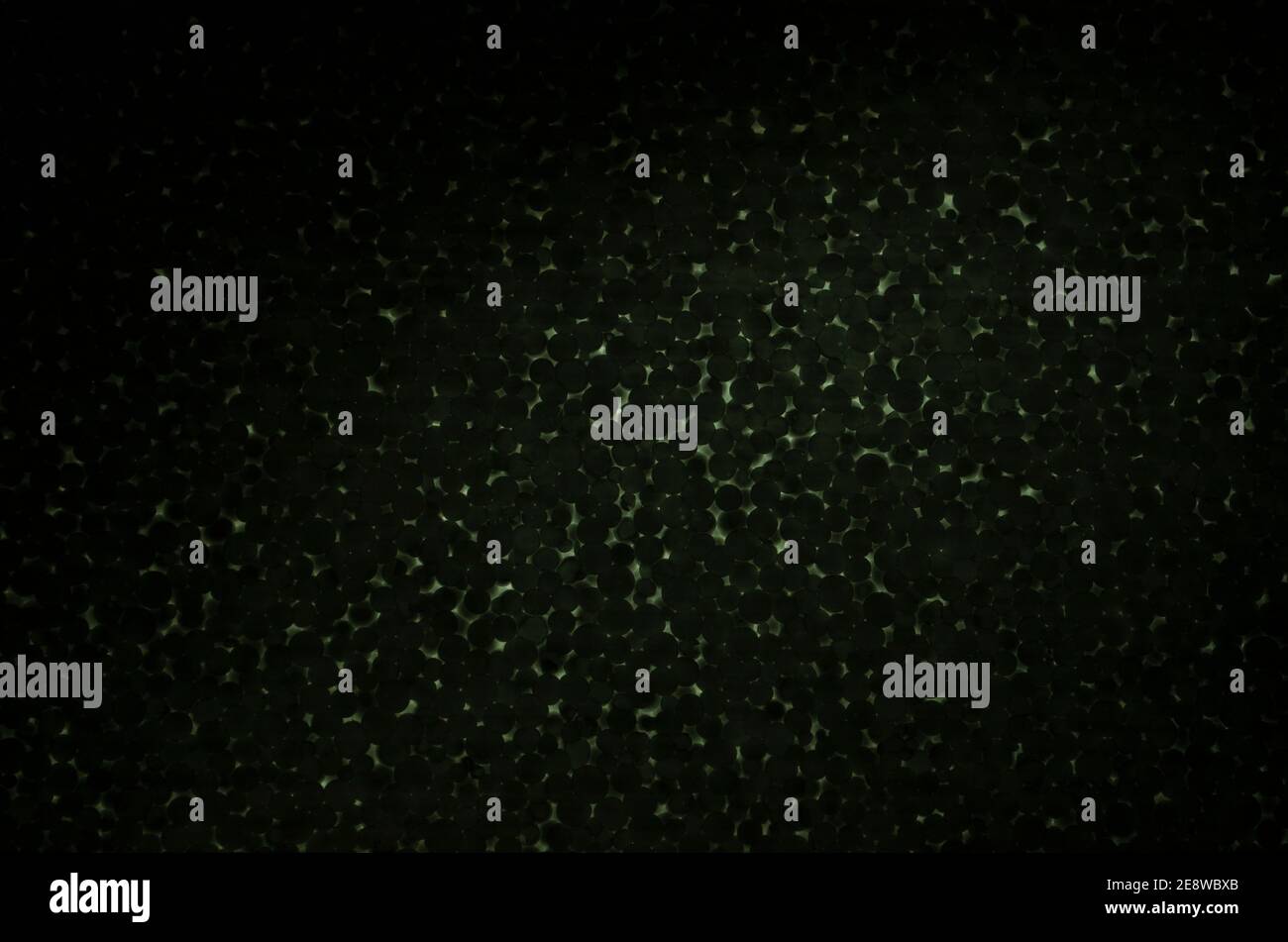 Polystyrene foam close-up. Bubbles Styrofoam texture background. Black ...