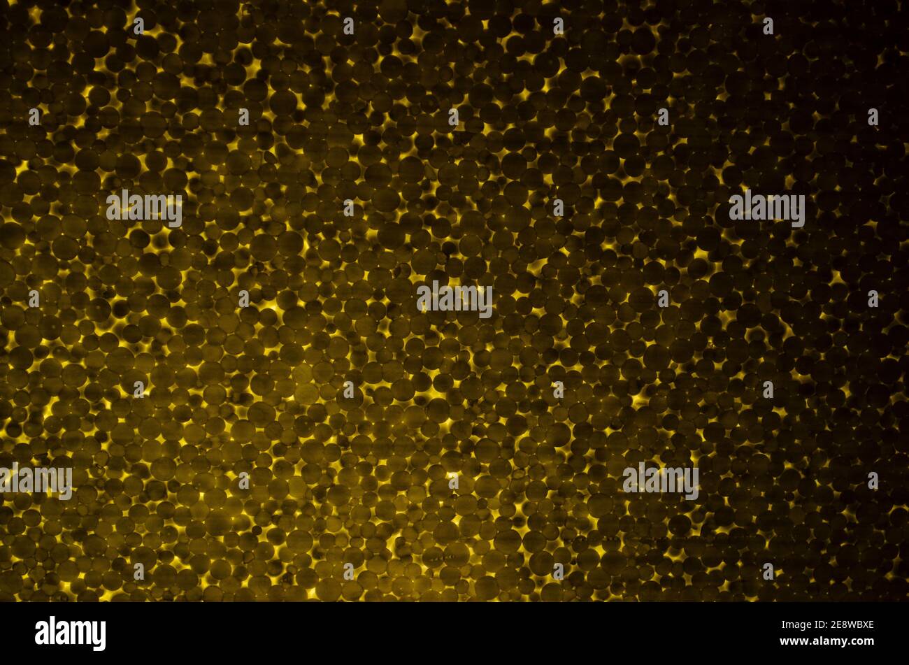 Polystyrene foam close-up. Bubbles Styrofoam texture background. Yellow ...