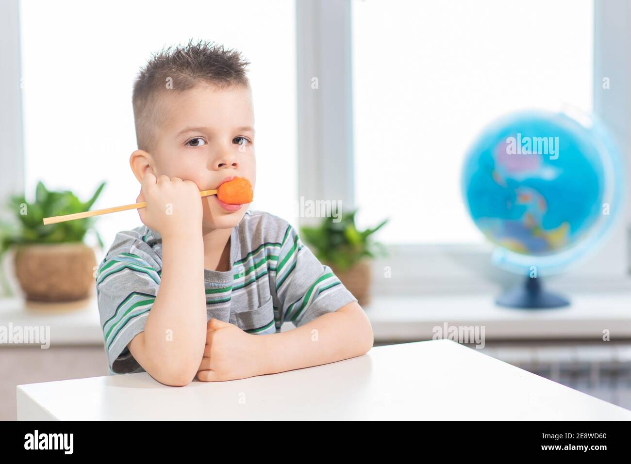 Child Bite Carrot High Resolution Stock Photography and Images - Alamy