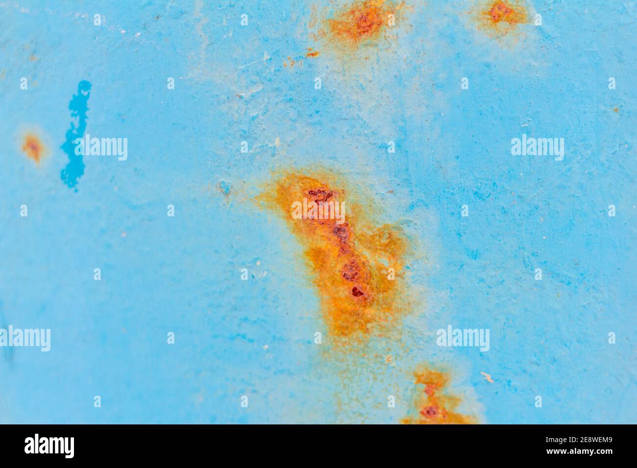 A blue metal wall with spots and streaks of rust Stock Photo - Alamy