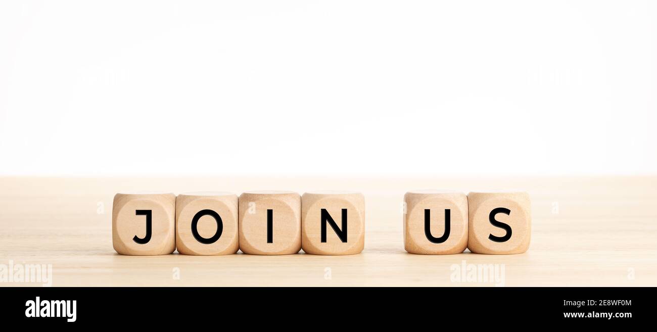 Join now word on wooden blocks on wood table. Copy space. White ...