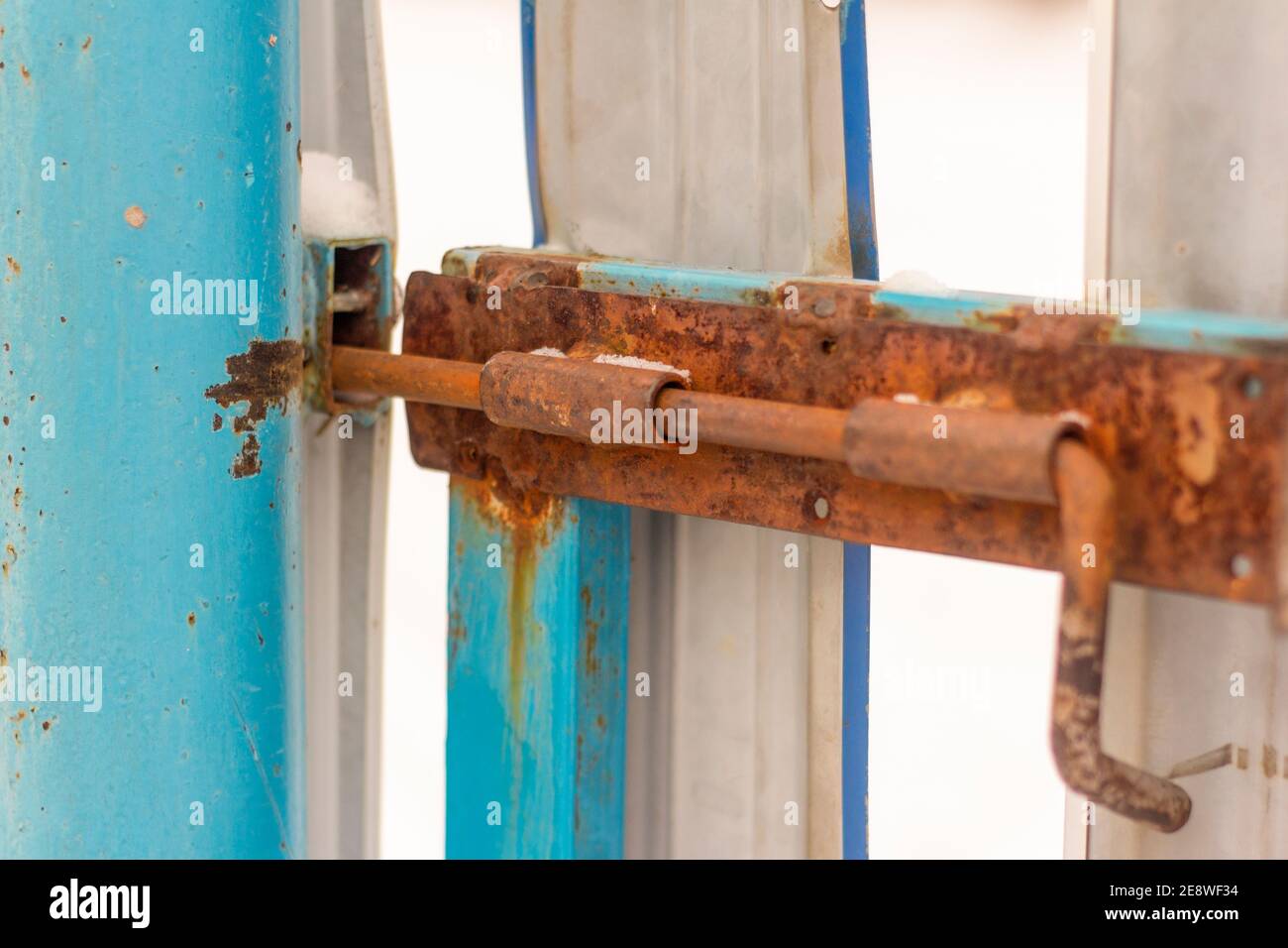A rusty old bolt on the metal doors Stock Photo - Alamy