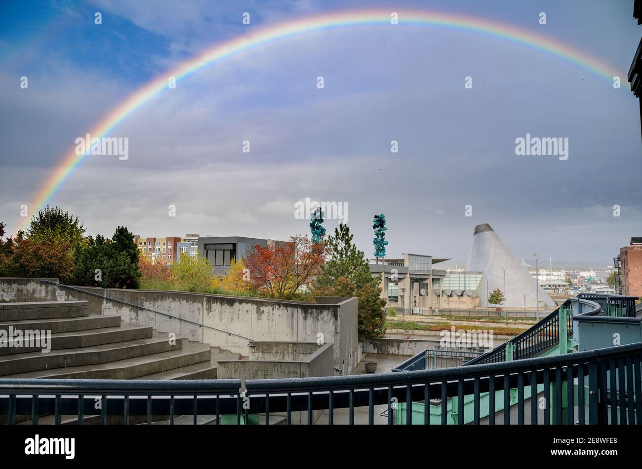 A rainbow encircles part of Tacoma viewed from the Washington State ...