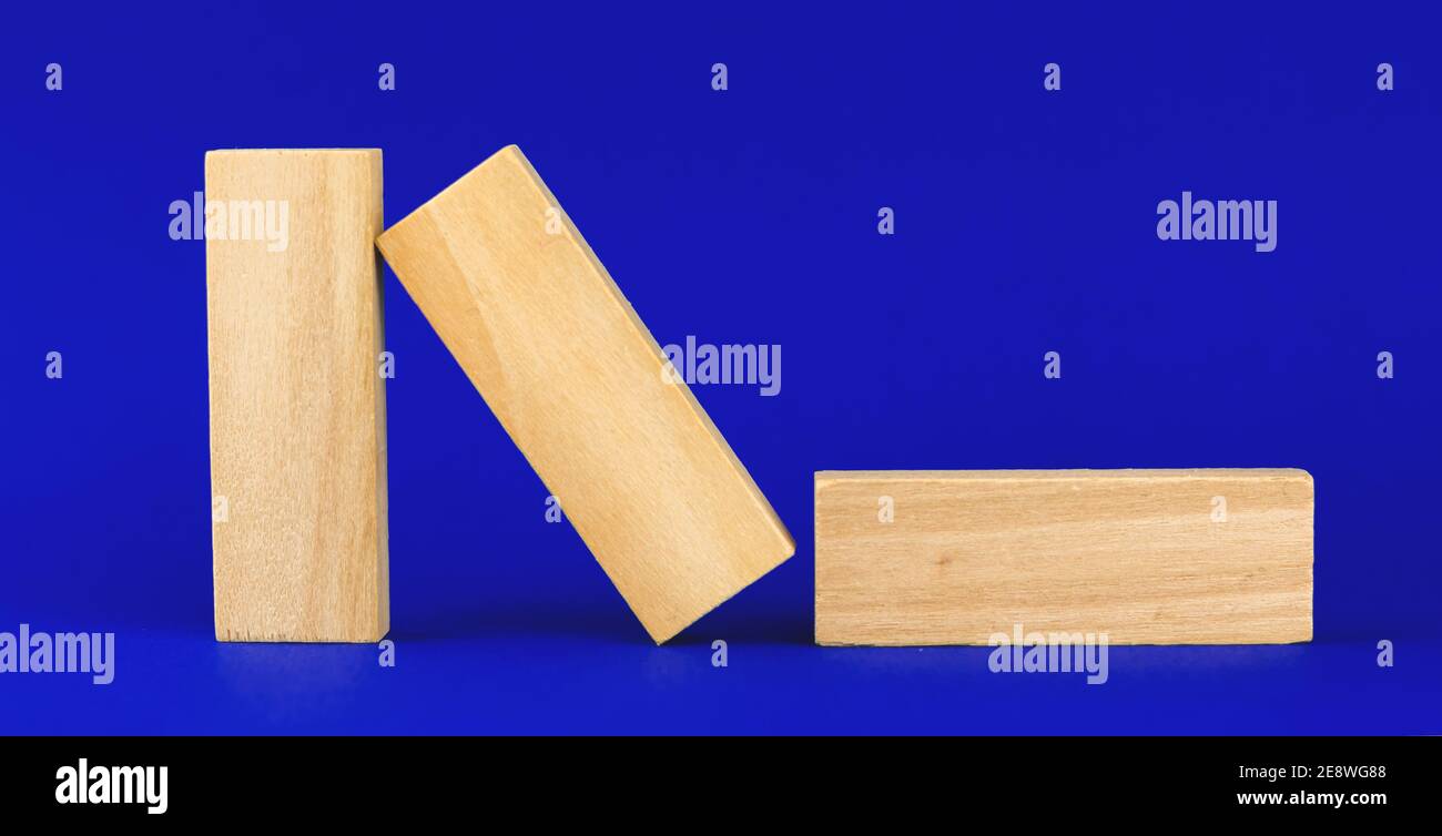 Business strategy banner or template with wooden peg, blocks on a blue ...