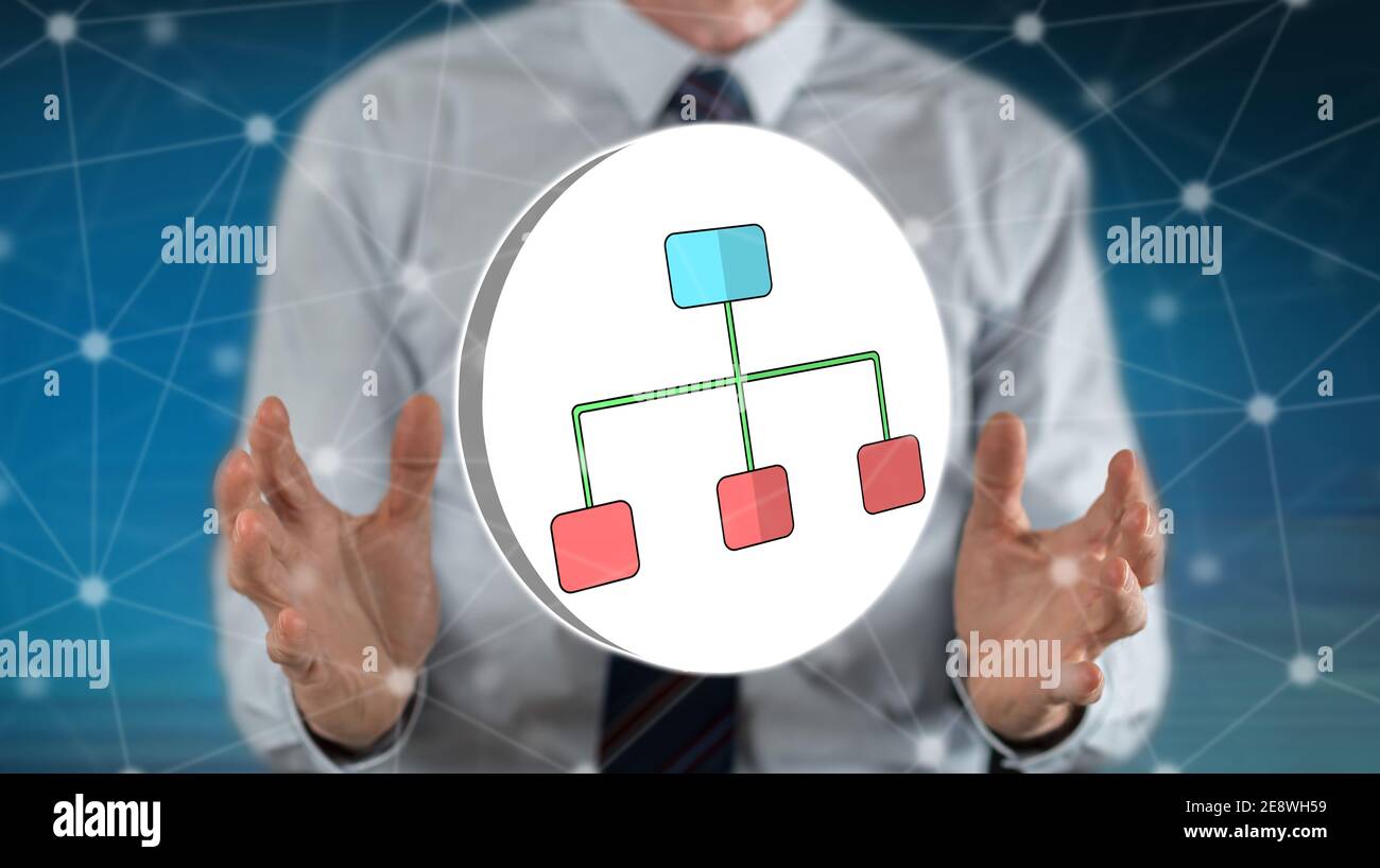 Hierarchy concept between hands of a man in background Stock Photo - Alamy