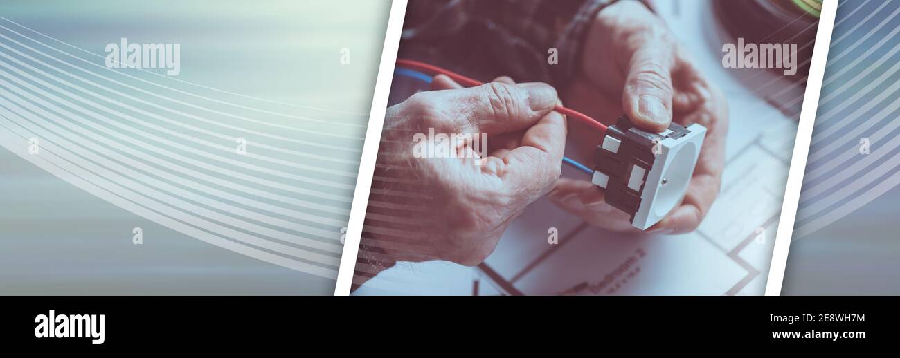 Electrician hands connecting a wire into a power socket; panoramic ...