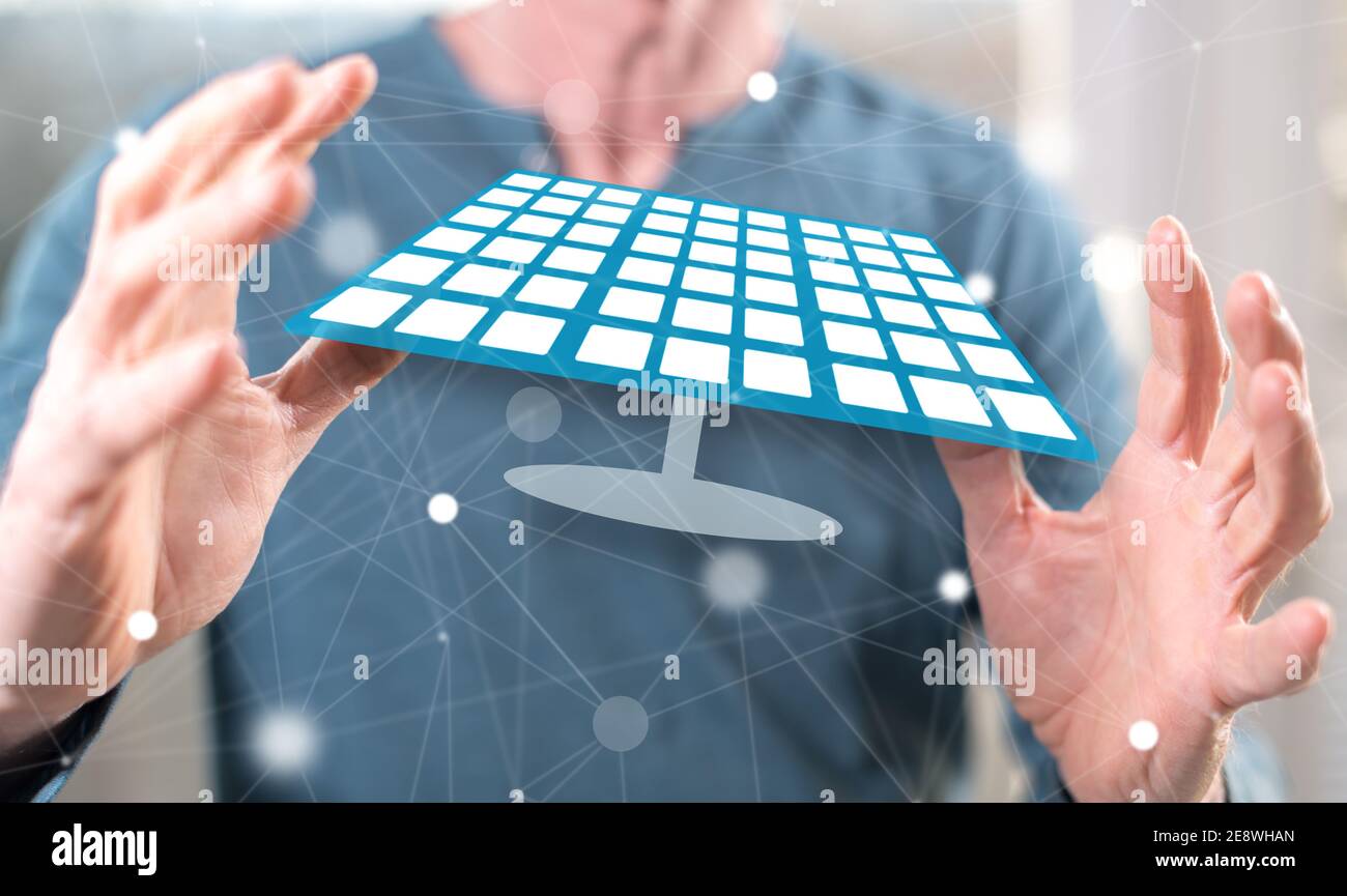 Clean energy concept between hands of a man in background Stock Photo ...