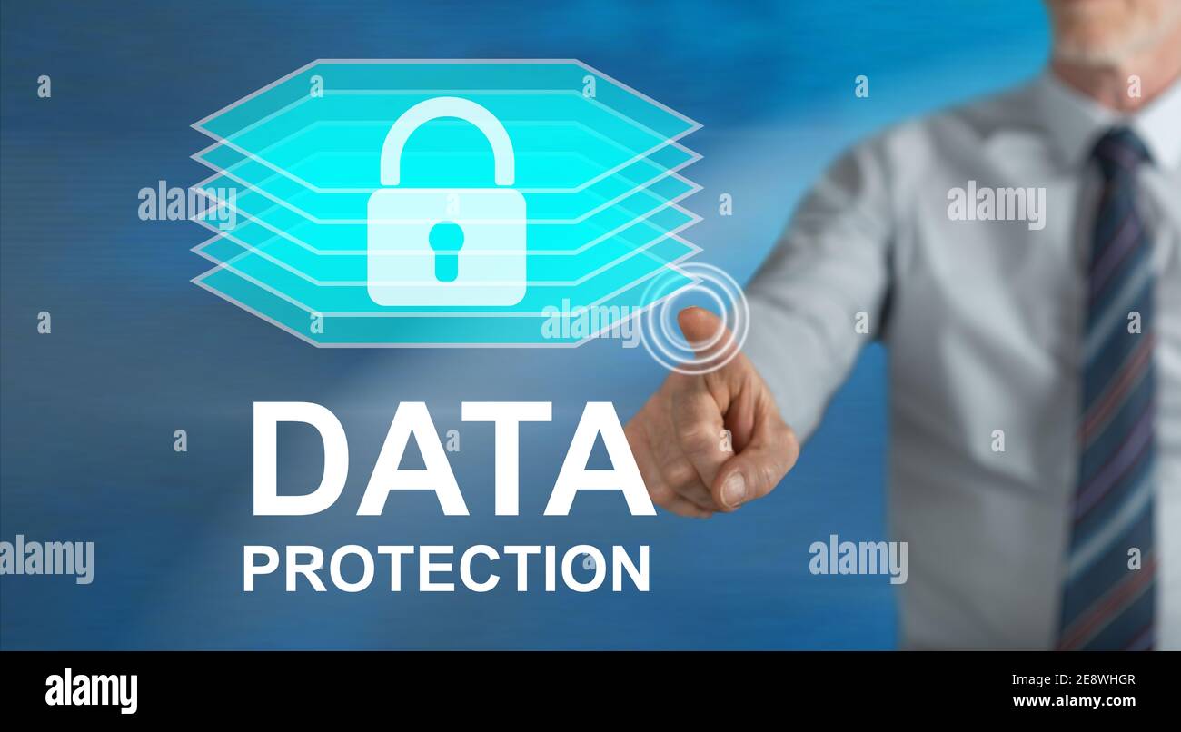 Man touching a data protection concept on a touch screen with his ...