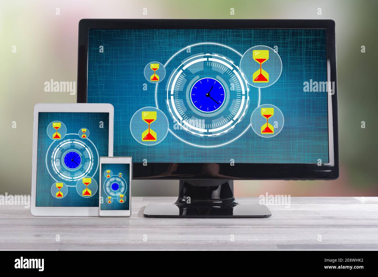 Time management concept shown on different information technology ...